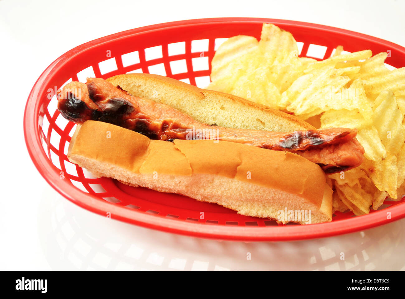 Takeout Hot Dog, Condiments, and Potato Chips Stock Photo - Alamy