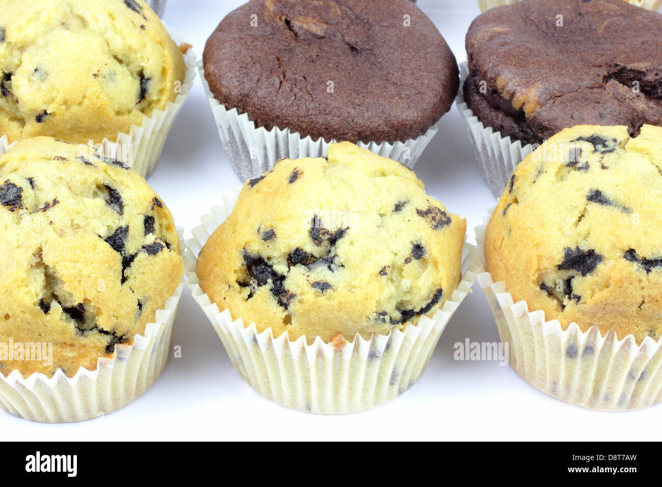 Muffins on the white background Stock Photo - Alamy