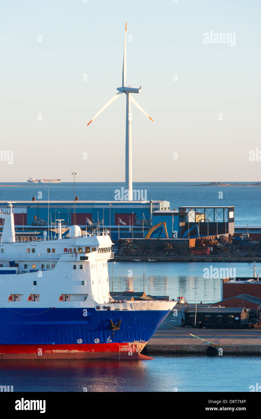 Cargo port ship windmill Stock Photo - Alamy