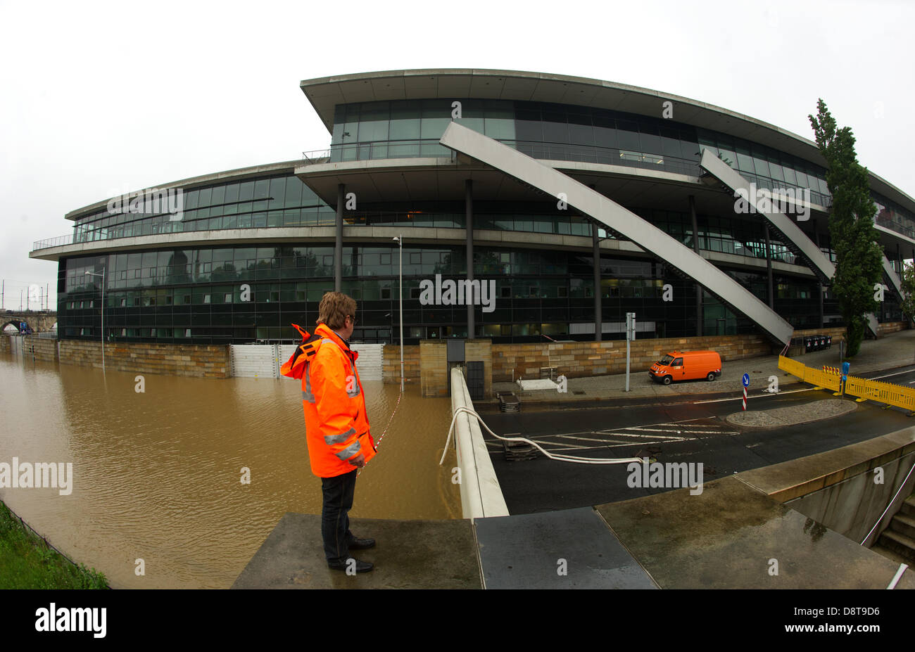 Water from the river Elbe stands in front of flooding protection gate ...