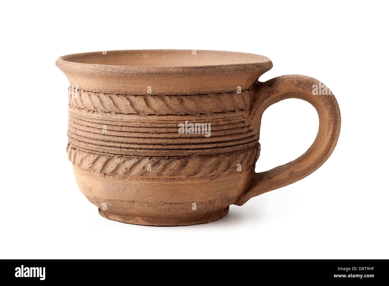 old clay cup isolated on white background Stock Photo - Alamy