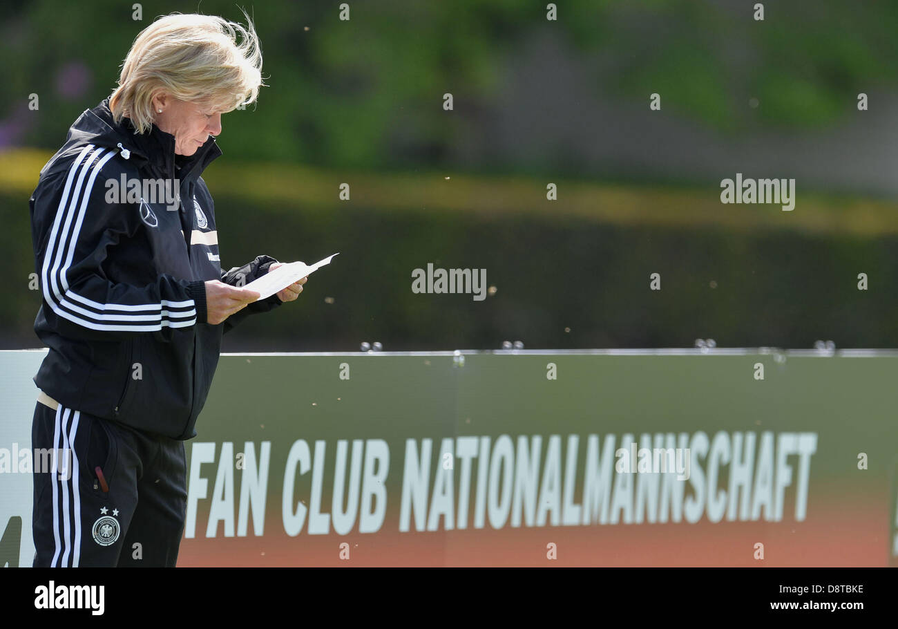 German national coach Silvia Neid observes a piece of paper during ...