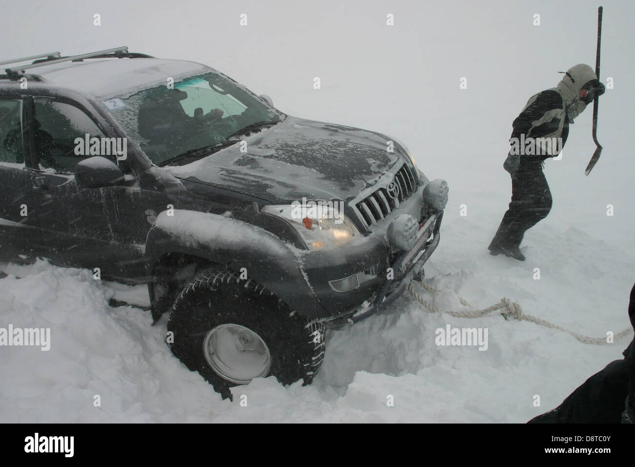 Car stuck in snowstorm, Iceland Stock Photo - Alamy