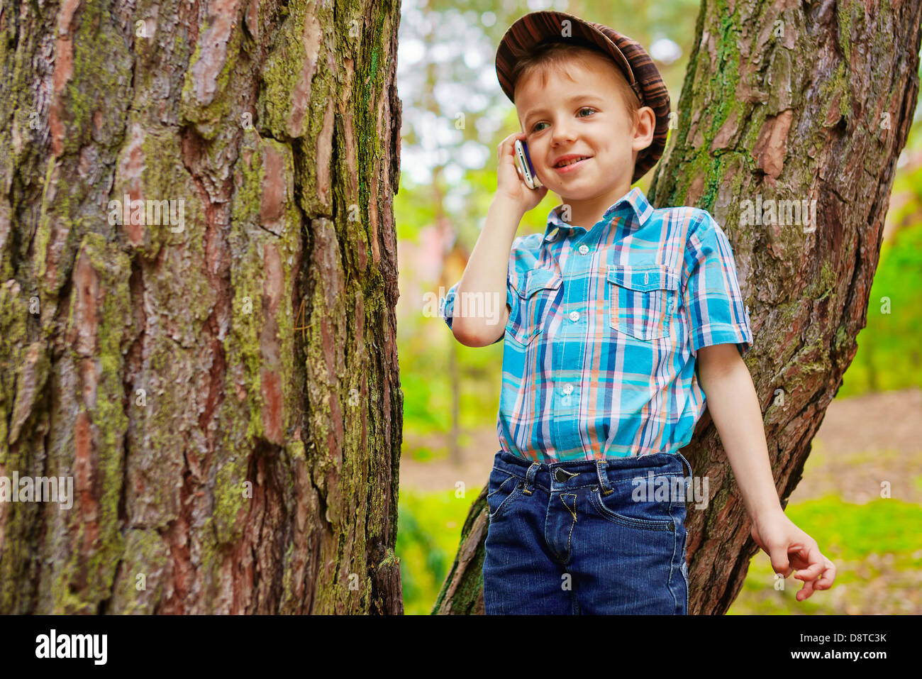 Young stylish boy talking on mobile phone Stock Photo - Alamy