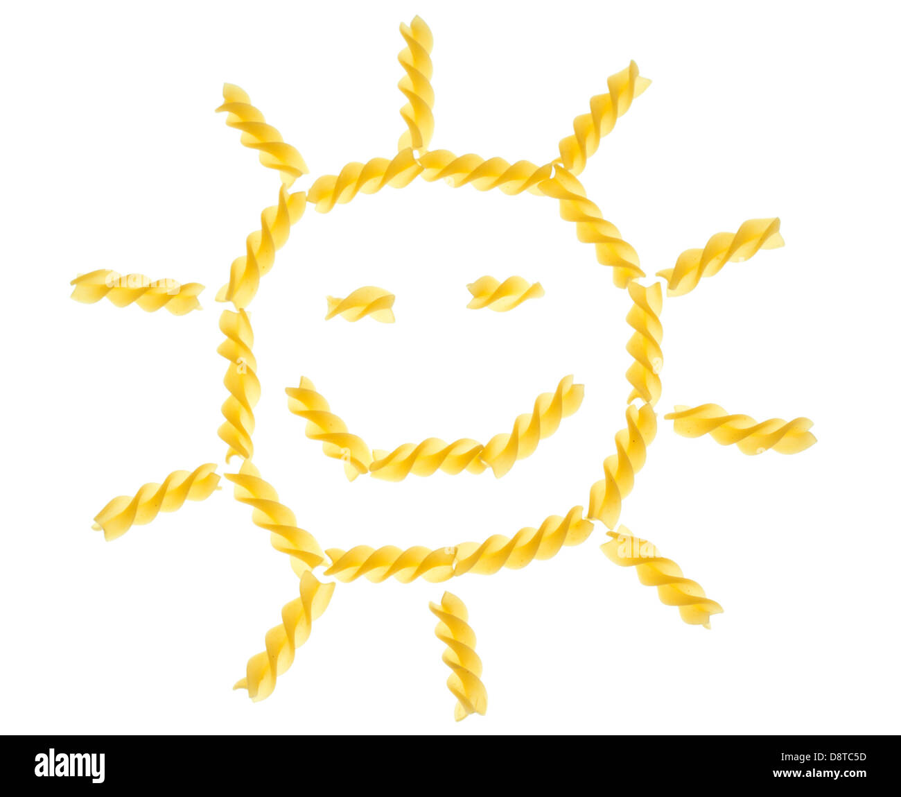 sun made from italian fusilli pasta isolated Stock Photo - Alamy