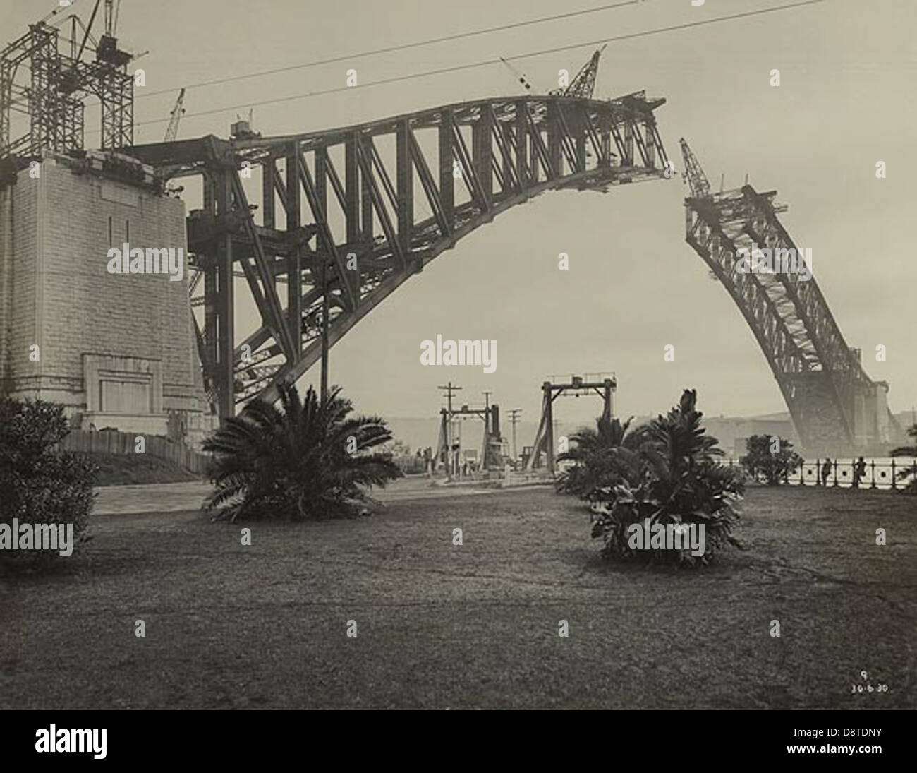 This archival photograph shows the Sydney Harbour Bridge under ...