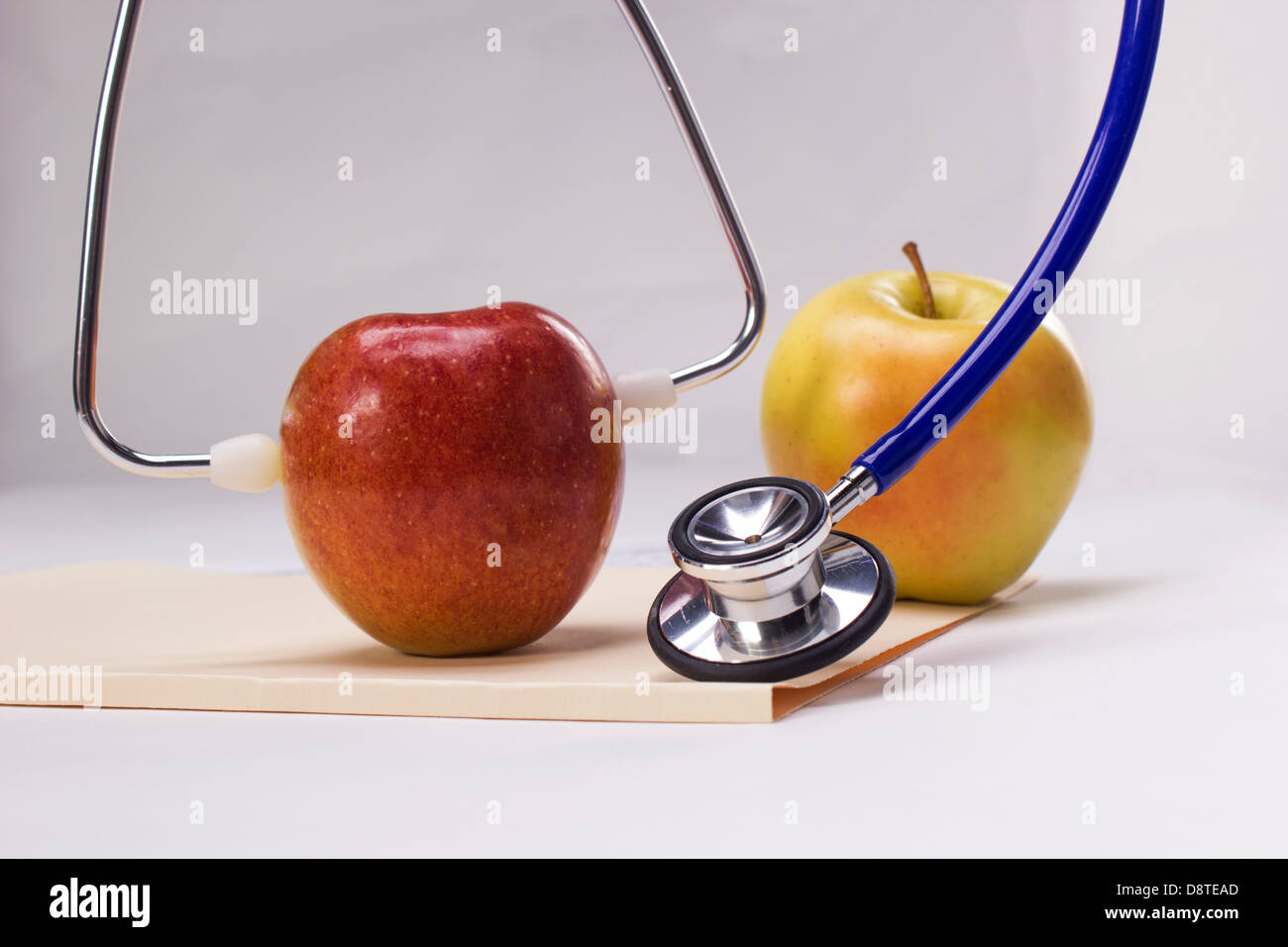 An apple a day keeps the doctor away Stock Photo - Alamy