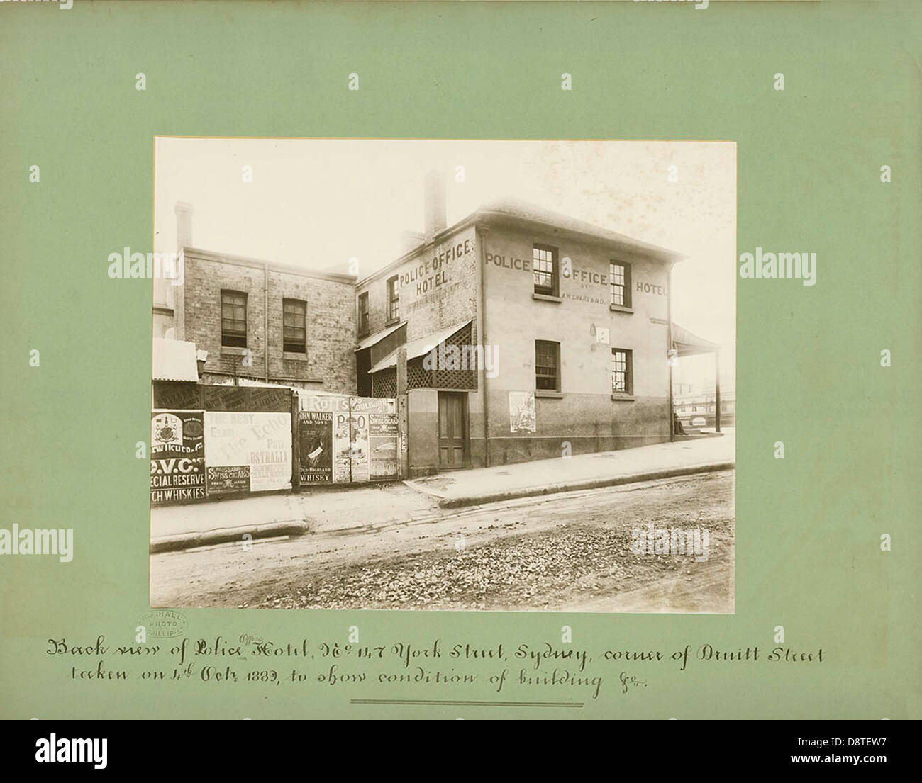 This black and white archival image shows the rear view of the 'Police ...