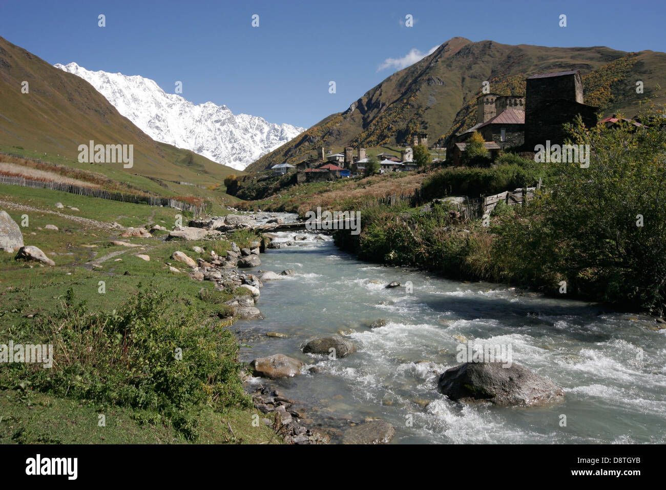 Defensive stone towers and traditional houses in Ushguli village near ...