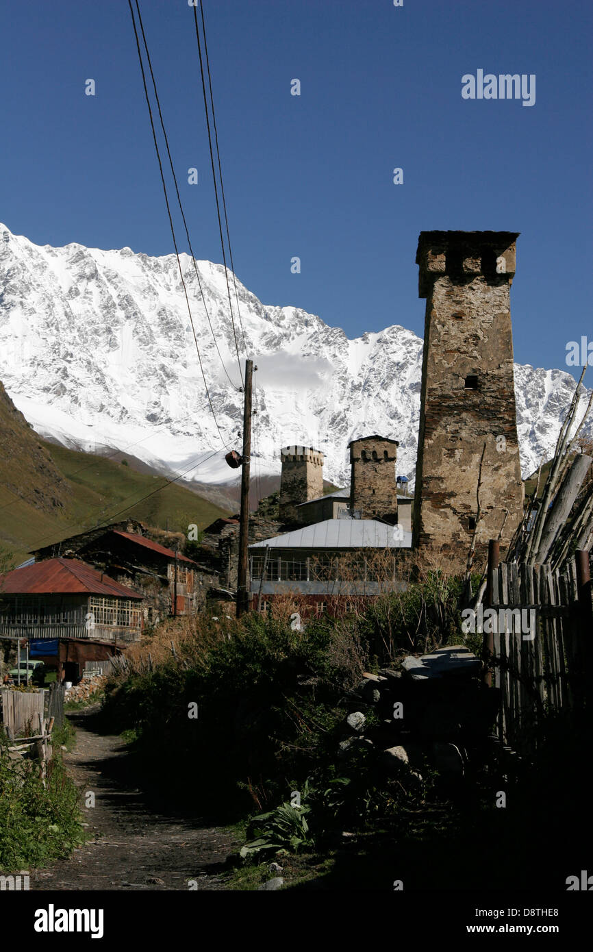 Defensive stone towers and traditional houses in Ushguli village near ...