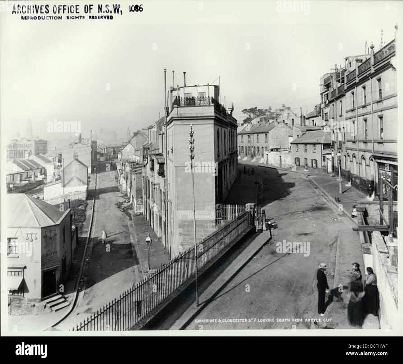 This black-and-white photograph depicts the Argyle Cut in The Rocks ...
