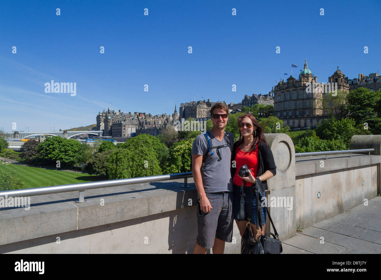 A portrait picture of a couple in Edinburgh Princess Street Gardens ...