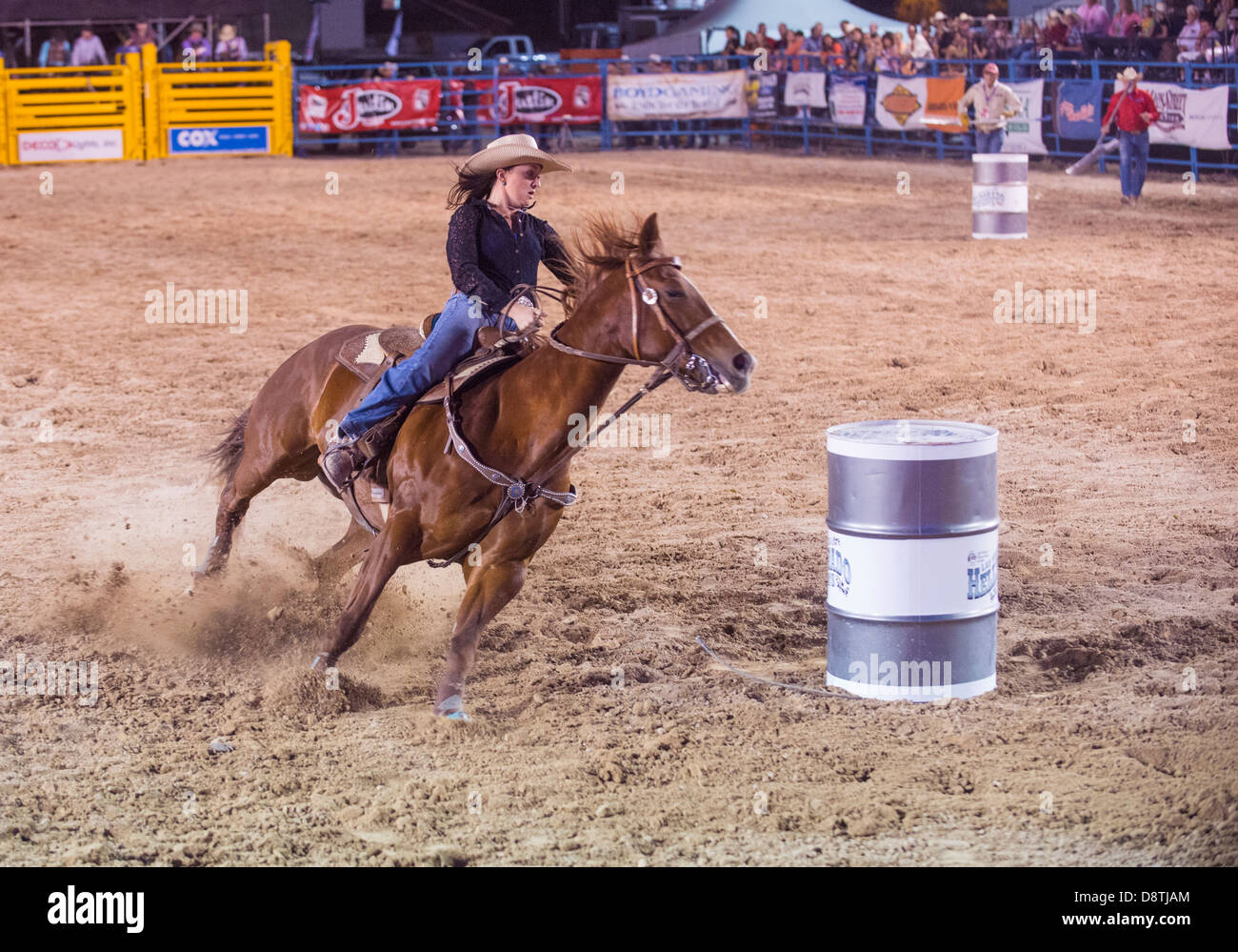 Cowgirl Participant in a Barrel racing competition at the Helldorado ...