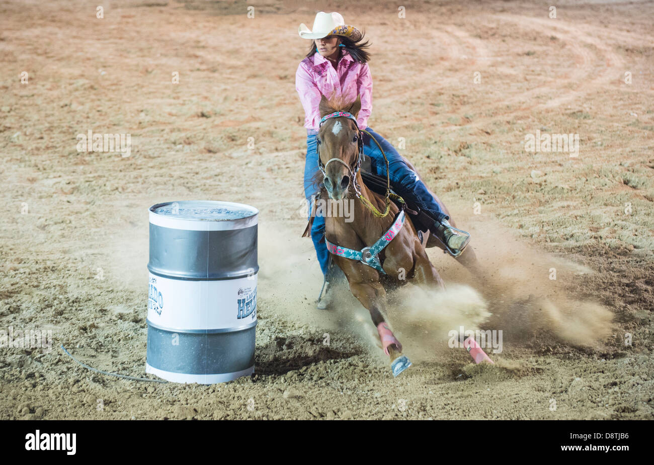 Cowgirl Participant in a Barrel racing competition at the Helldorado ...