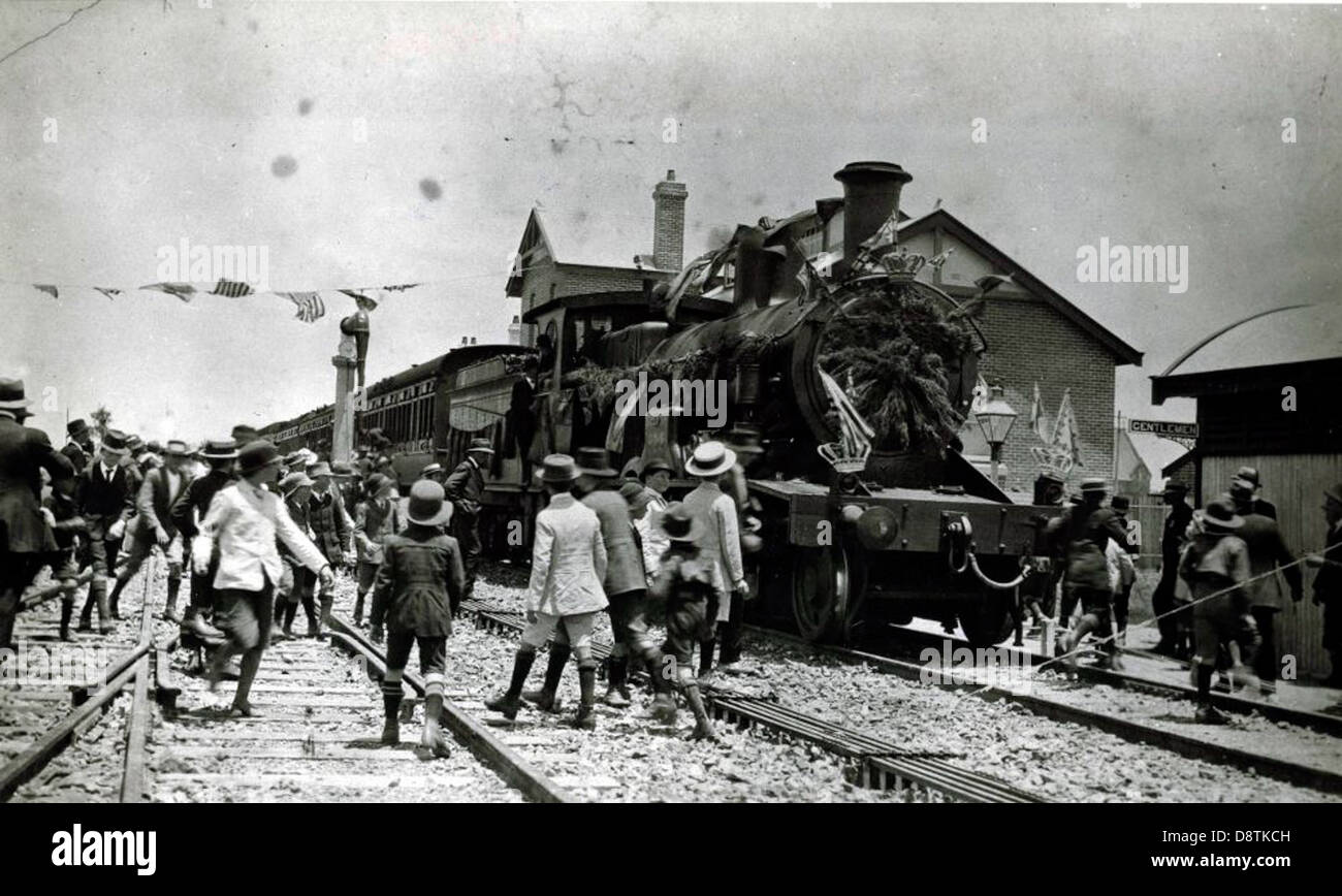 A black-and-white historical photograph documenting the first train's ...