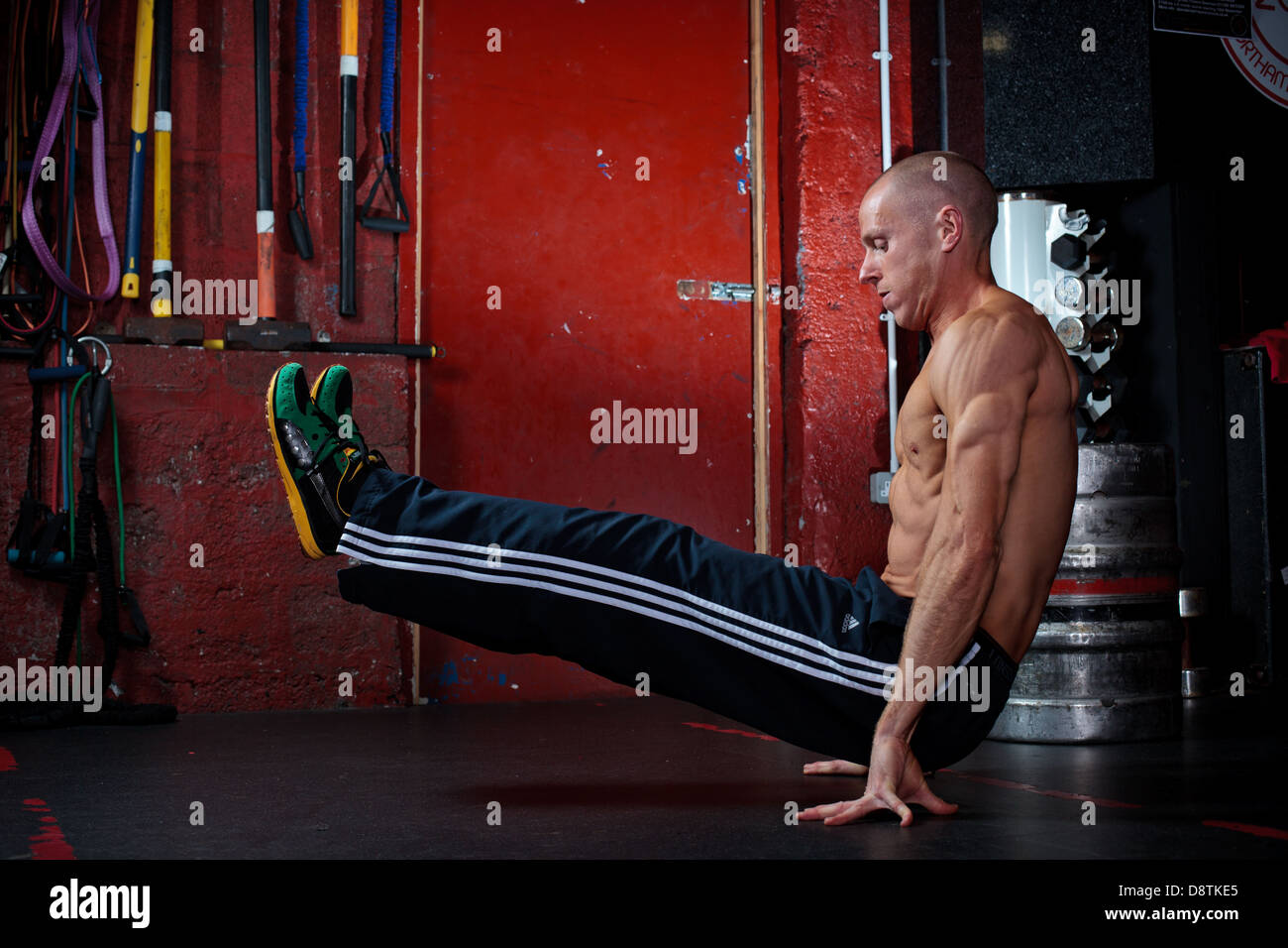Personal Trainer Rhys John, working out with series of body weight ...