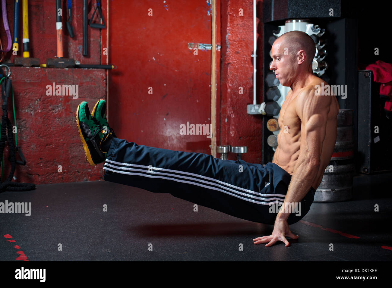 Personal Trainer Rhys John, working out with series of body weight ...