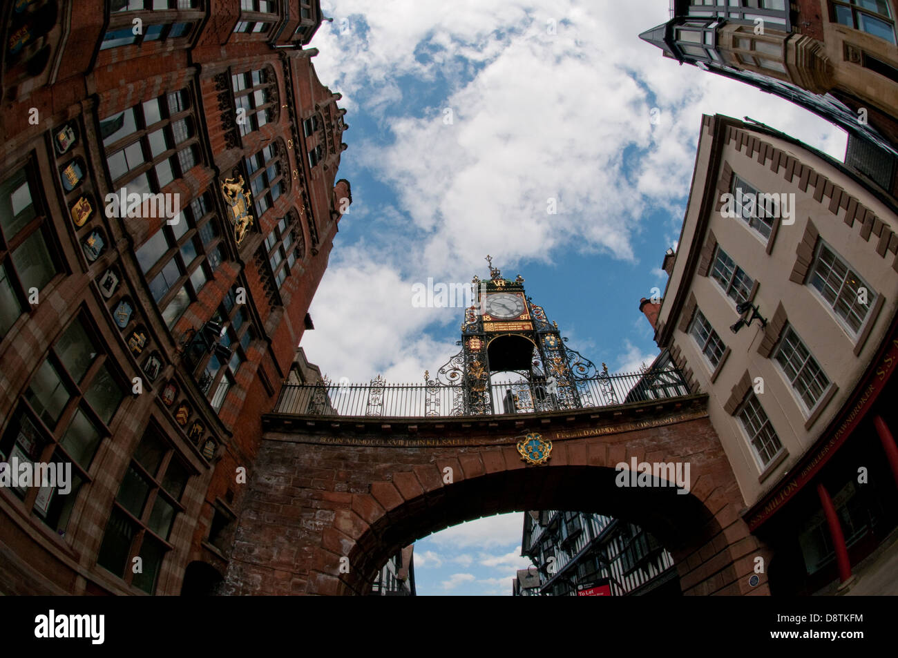 Fisheye view of Eastgate clock, bridge and buildings in Chester, United ...