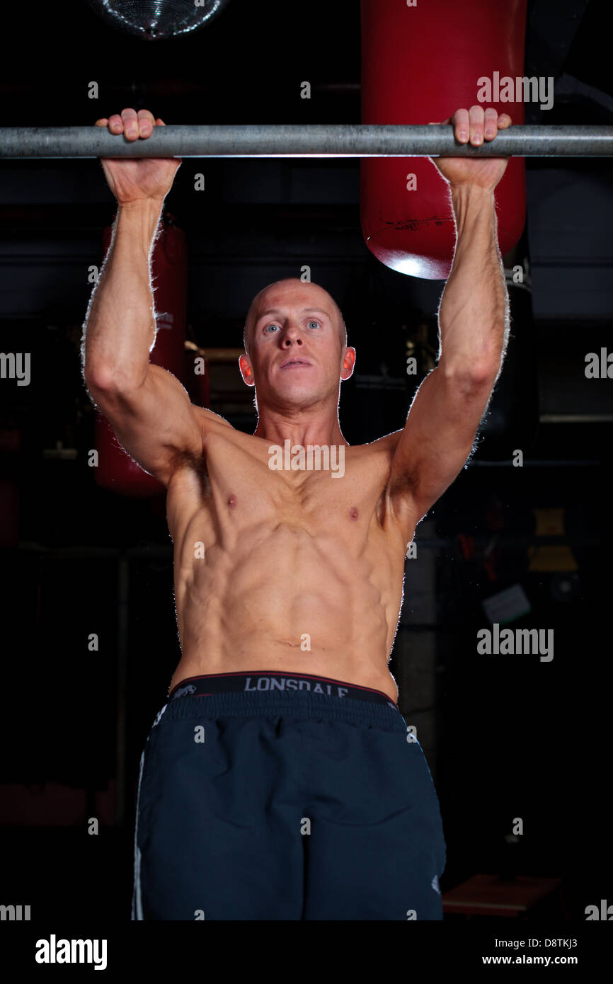 Personal Trainer Rhys John, working out with series of body weight ...