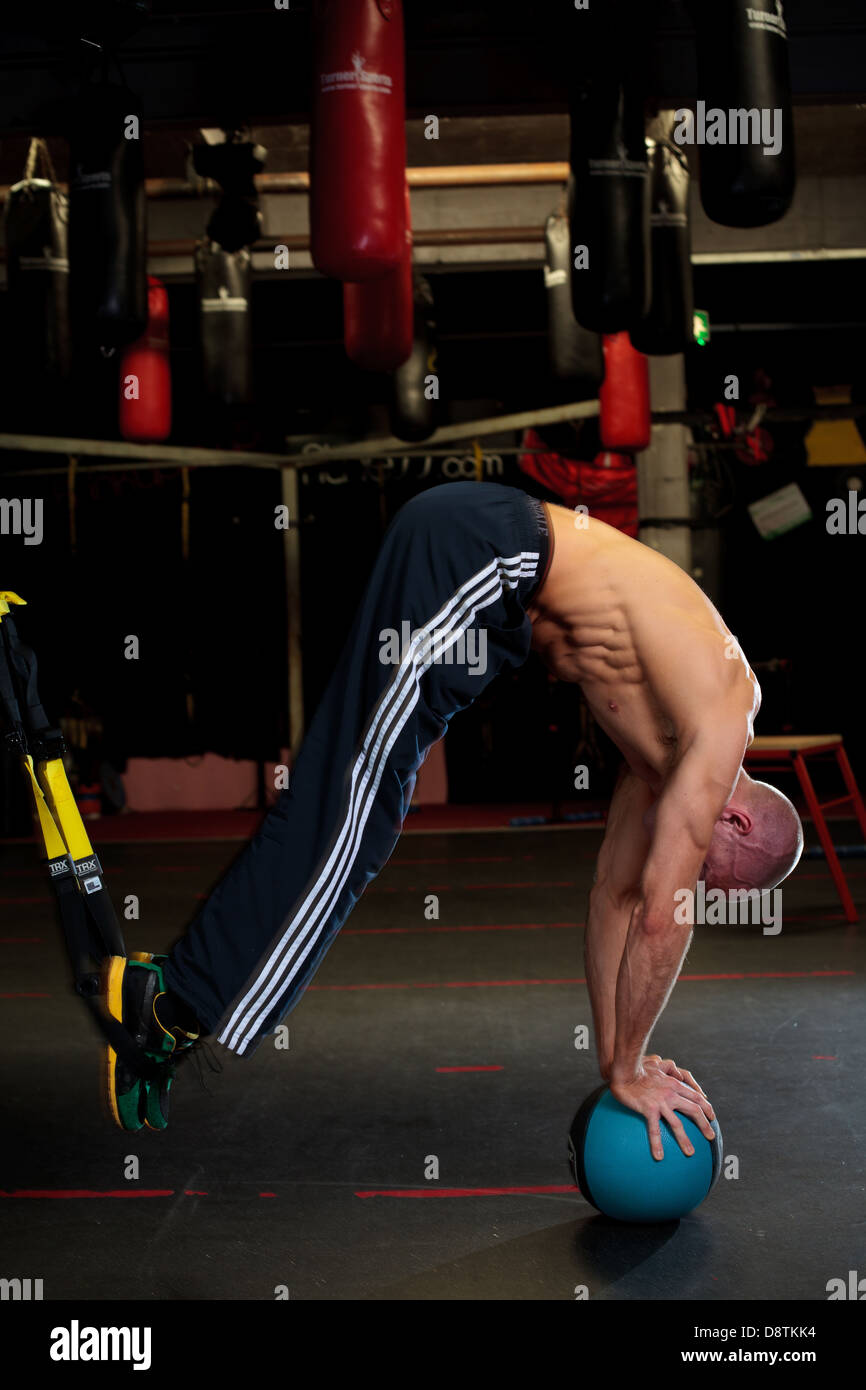 Personal Trainer Rhys John, working out with series of body weight ...