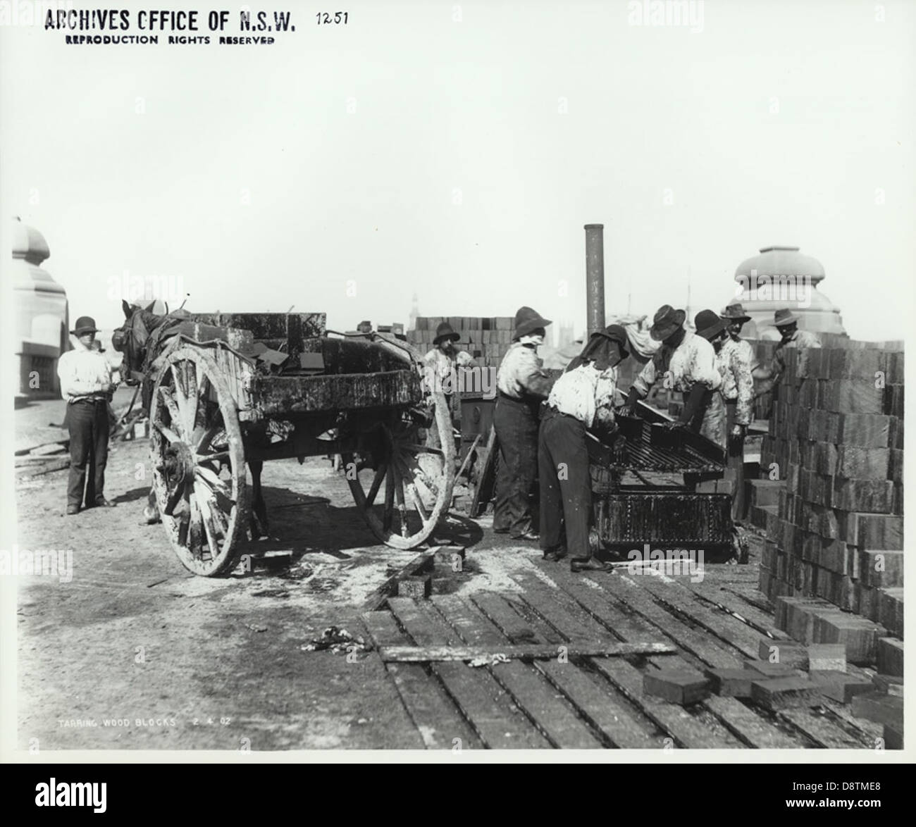 A black-and-white historical photograph showing construction work on ...