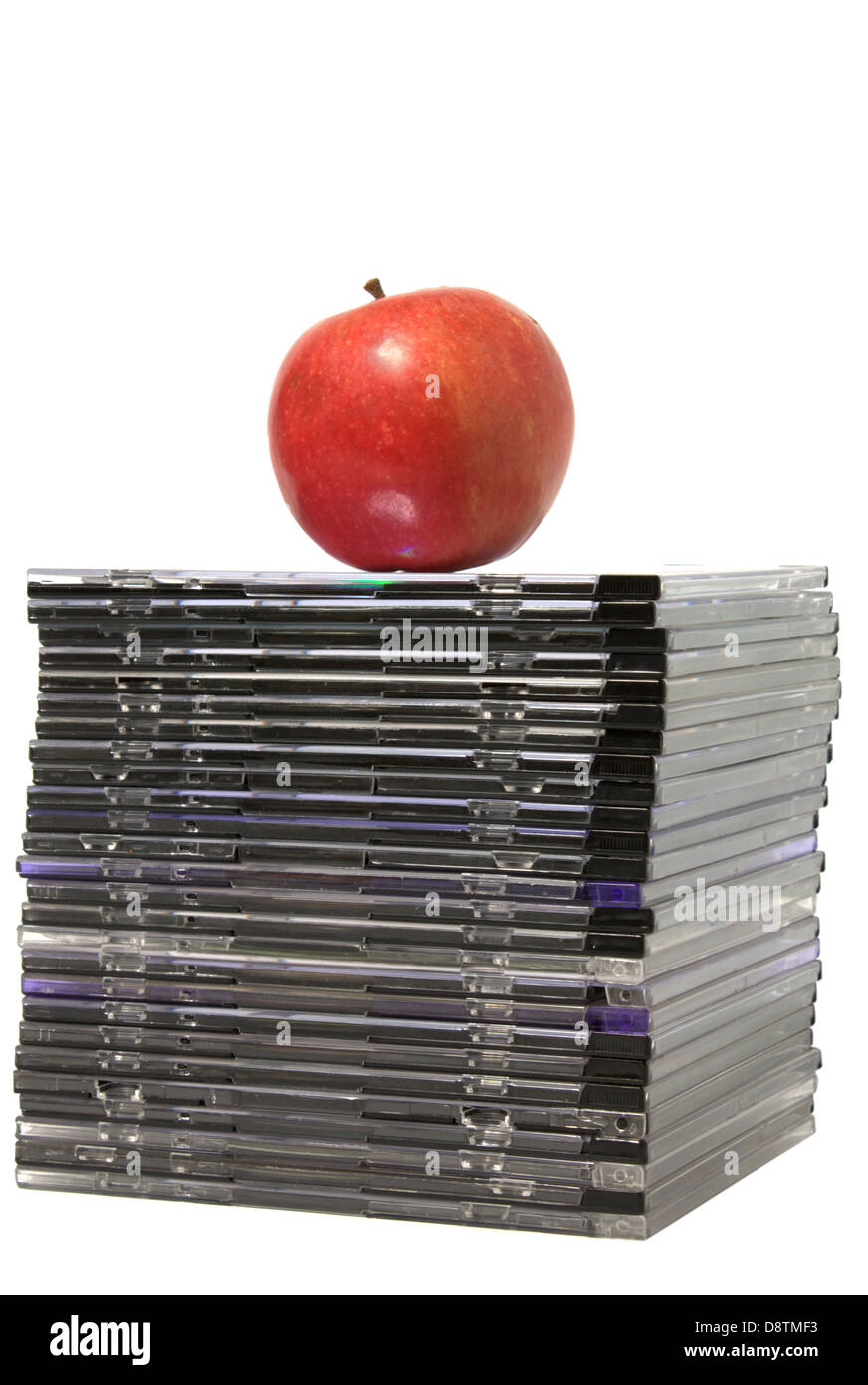 Red apple and cd it is isolated on white Stock Photo - Alamy