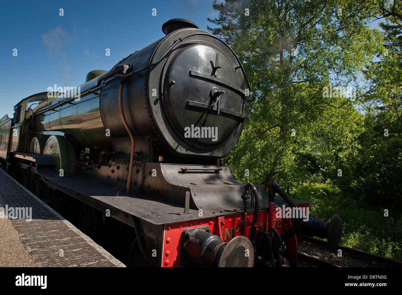 Steam locomotive awaiting at platform for passengers Stock Photo - Alamy