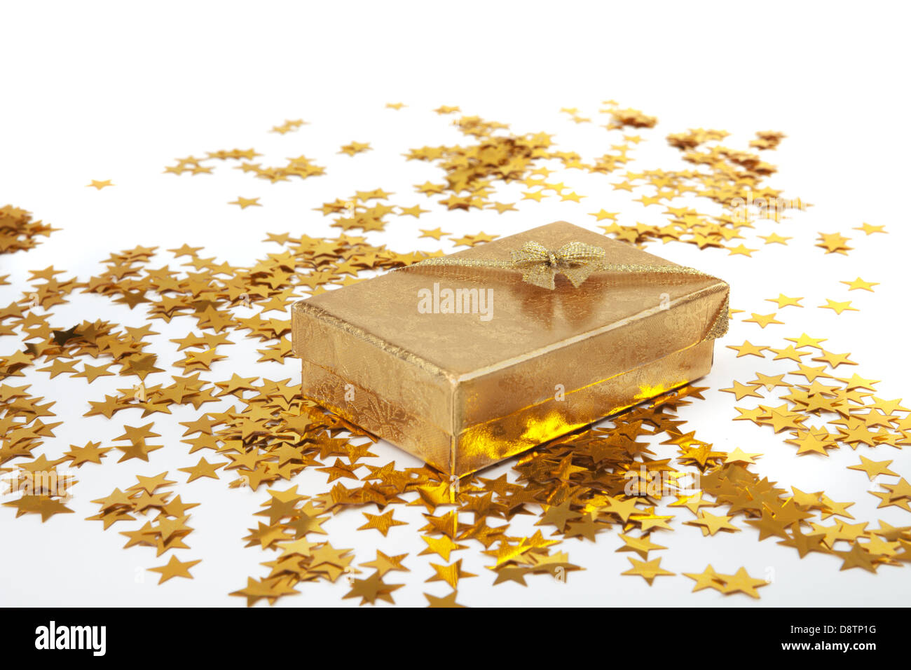 gift box and gold stars on white background Stock Photo - Alamy