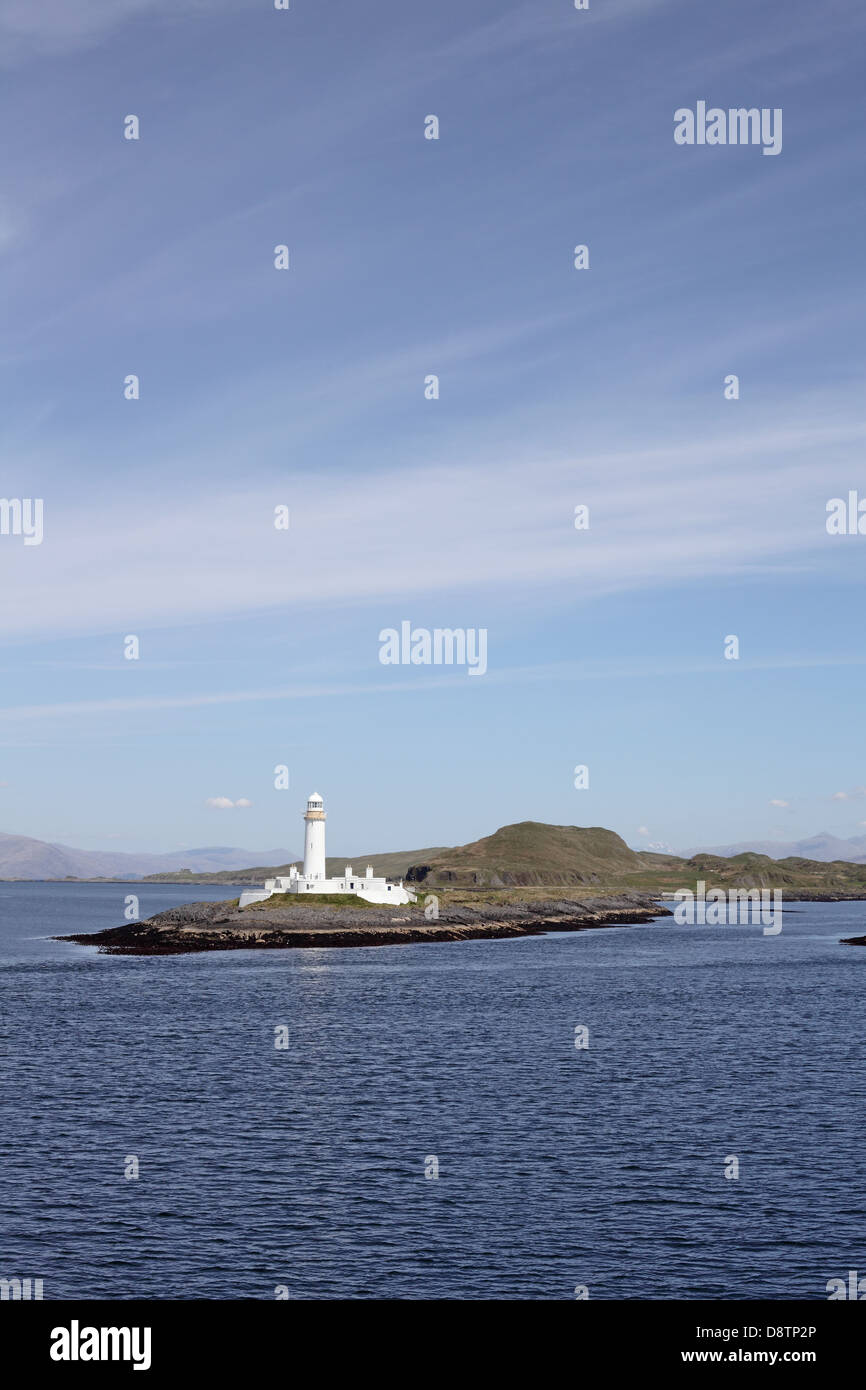 The white lighthouse on Great Benera in the Sound of Mull, Scotland ...