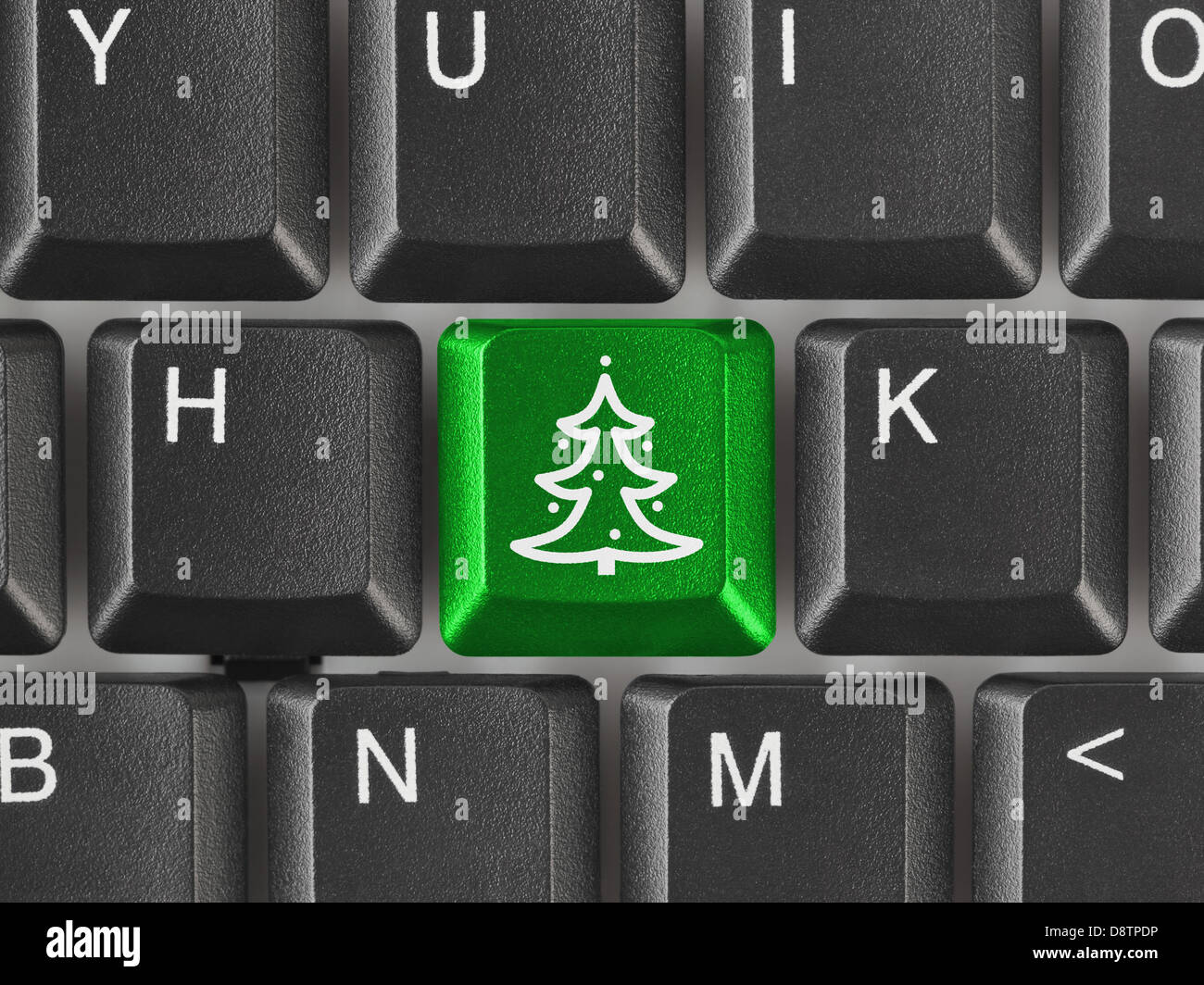Computer keyboard with Christmas tree key Stock Photo - Alamy