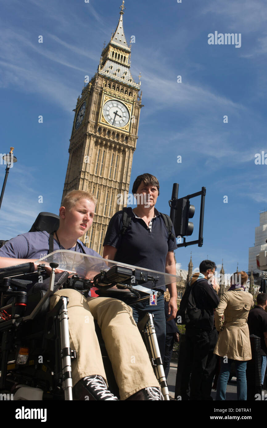 Londoners and visitors pass beneath Big Ben (now called Elizabeth Tower ...