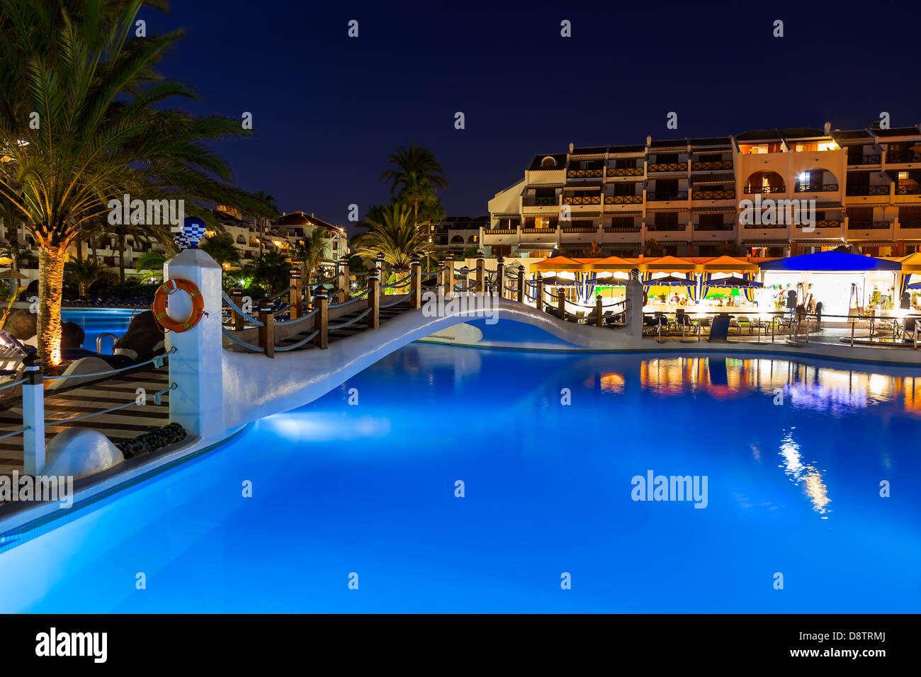 Swimming pool at night Stock Photo - Alamy