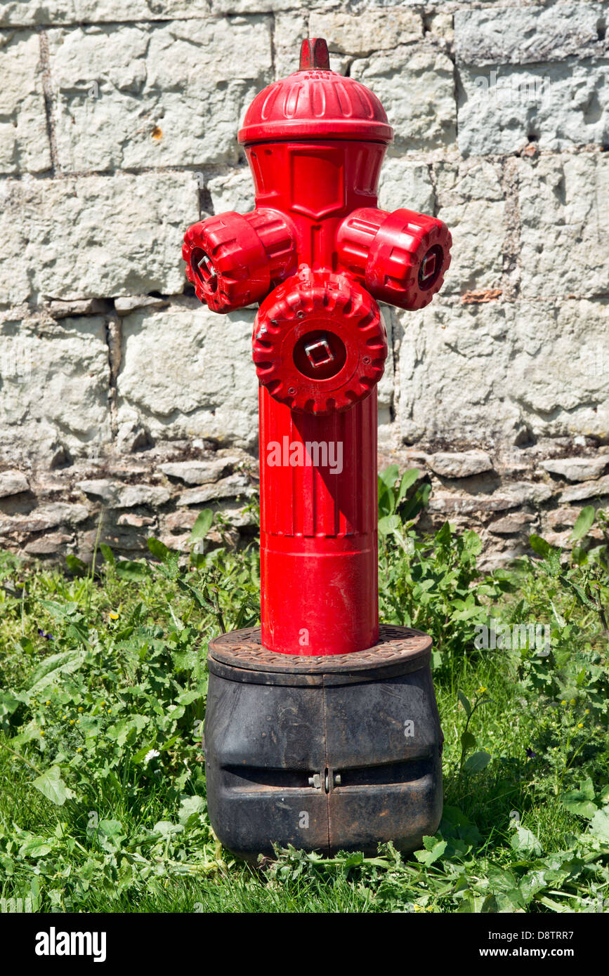 A typical red French fire hydrant Stock Photo - Alamy