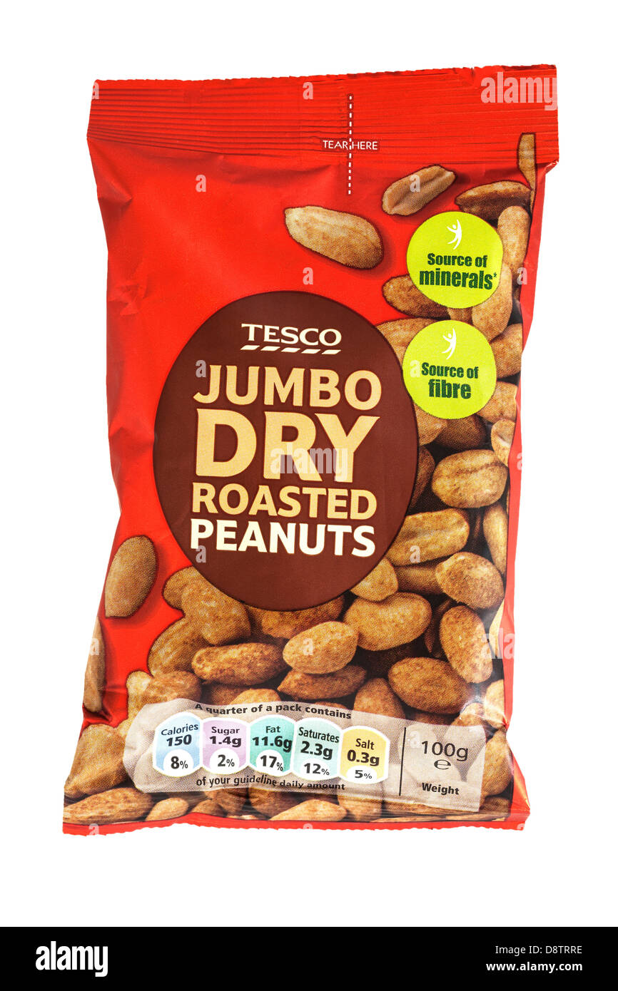 A packet of Tesco jumbo dry roasted peanuts on a white background Stock ...