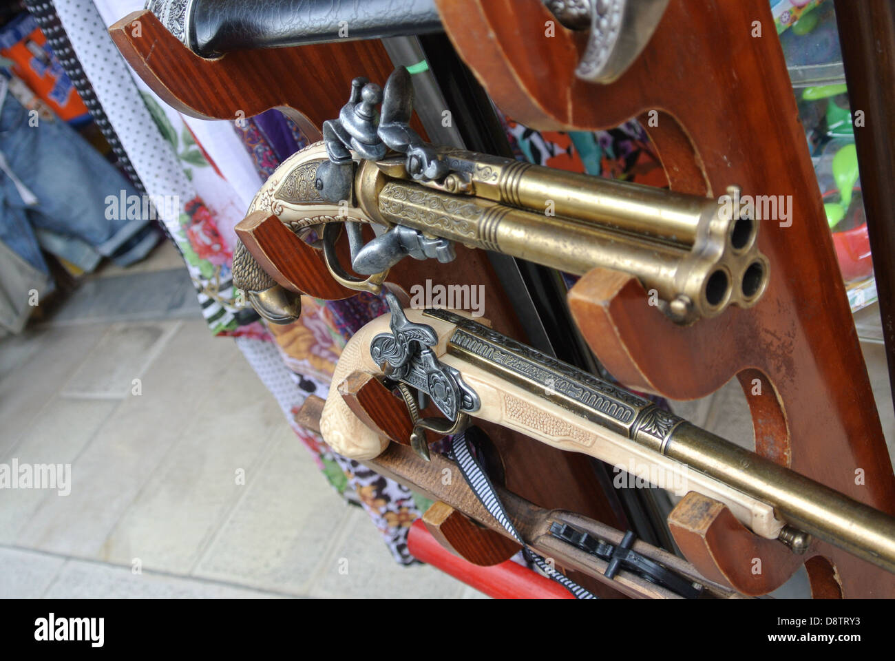 Hand crafted unique guns sold in Corfu market town Stock Photo - Alamy