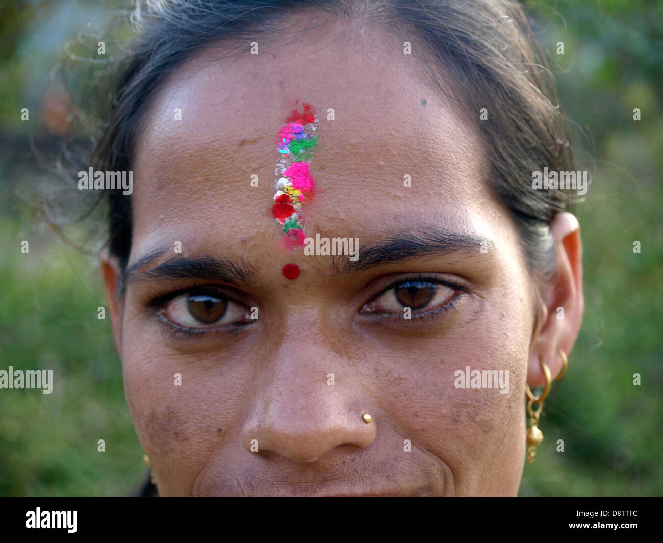 tika on the face of a Hindu girl in nepal Stock Photo - Alamy