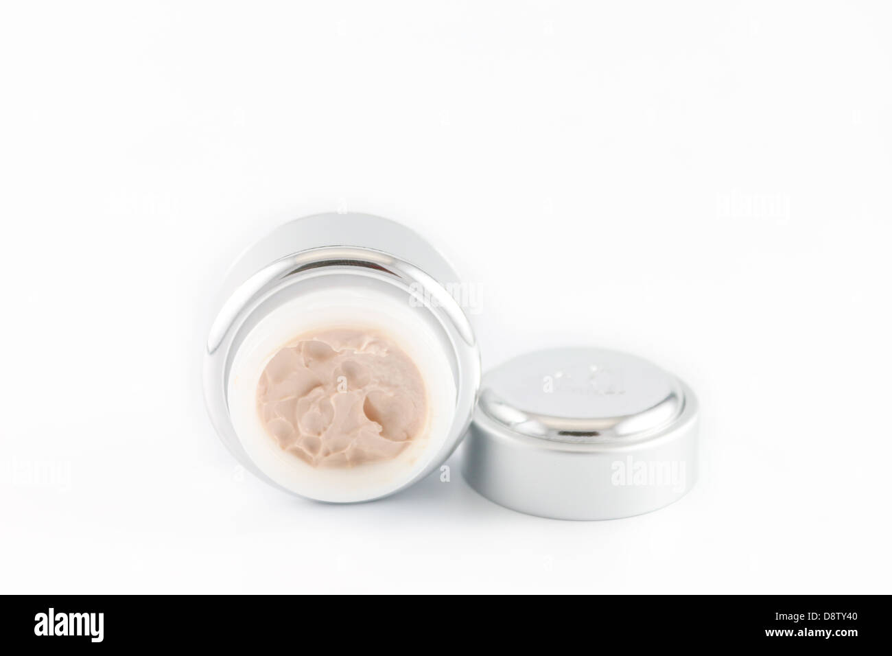 Open jar of cosmetic face cream Stock Photo - Alamy