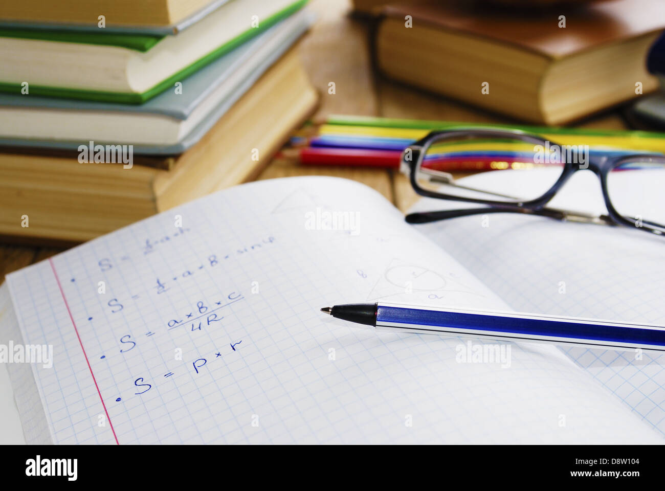The textbook with pen Stock Photo - Alamy