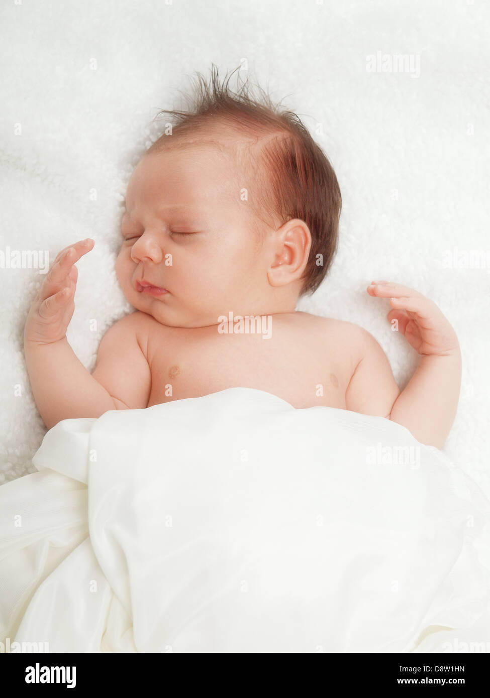 Sleeping two week old baby Stock Photo - Alamy