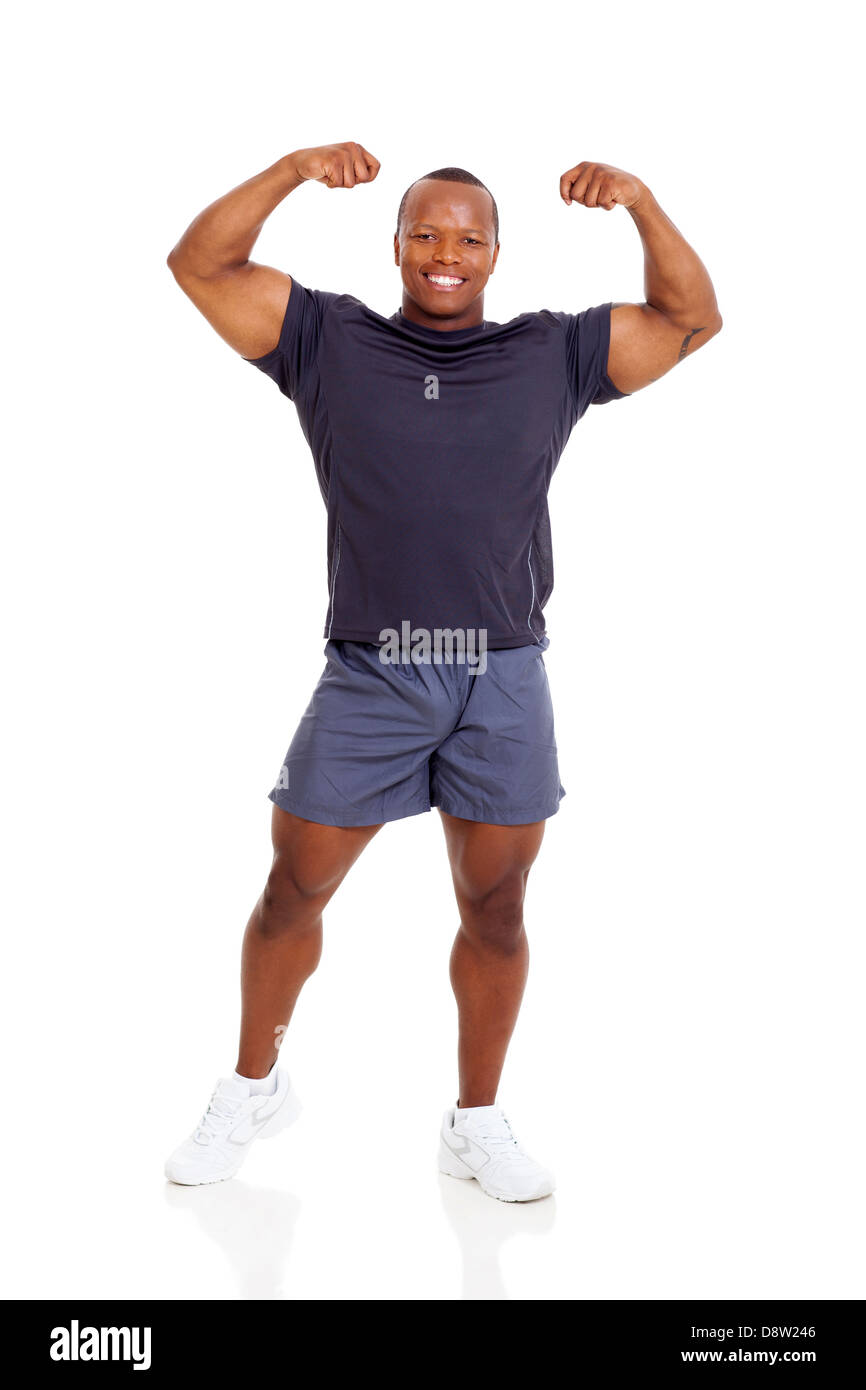 cheerful african muscular man showing muscles, isolated on white ...