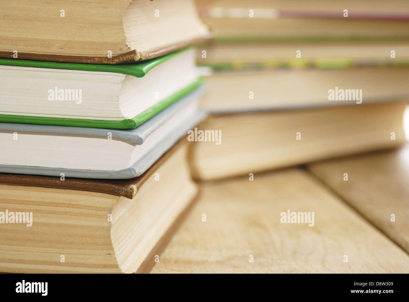 Many books on the table Stock Photo - Alamy