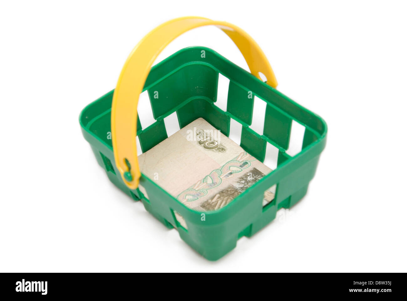 green basket with a banknote Stock Photo - Alamy