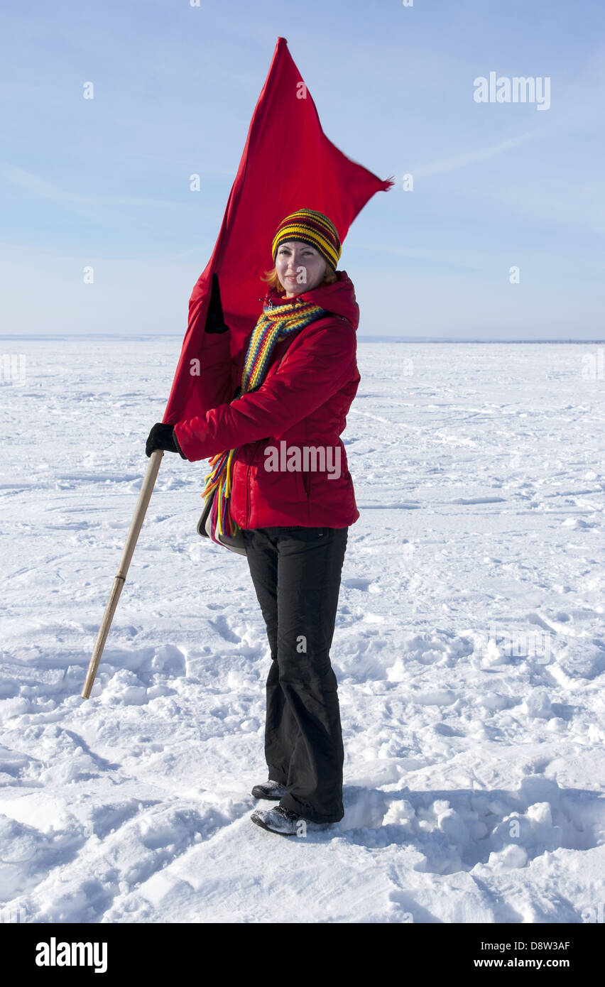 Happy girl with a red flag Stock Photo - Alamy
