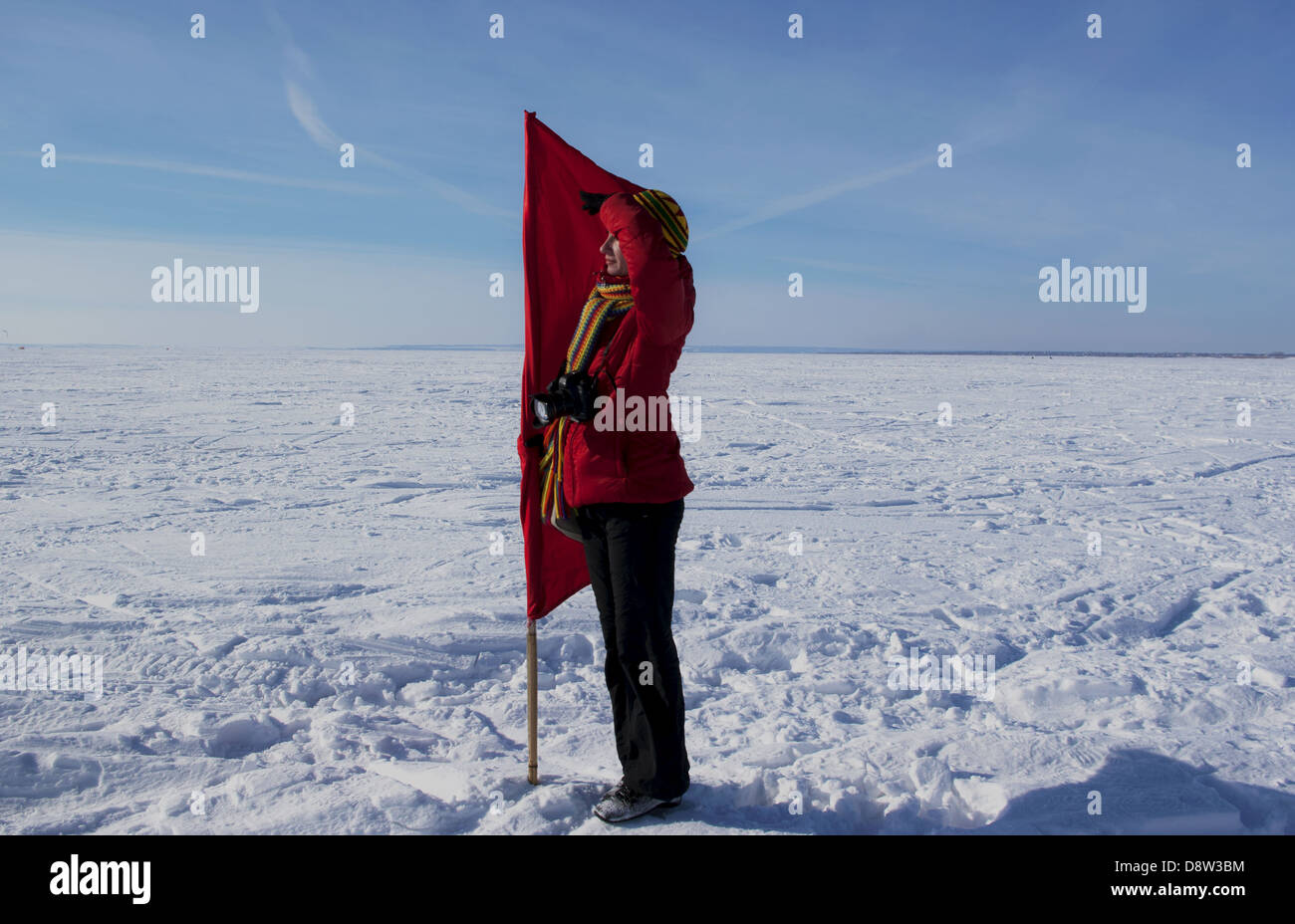 Happy girl with a red flag Stock Photo - Alamy