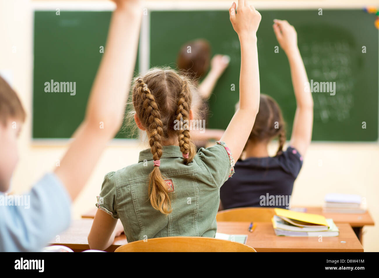 School children in classroom at lesson Stock Photo - Alamy