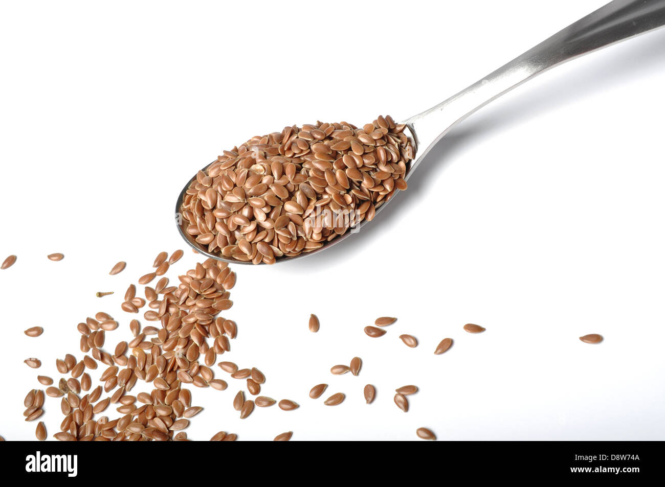 Flax seed on spoon Stock Photo - Alamy