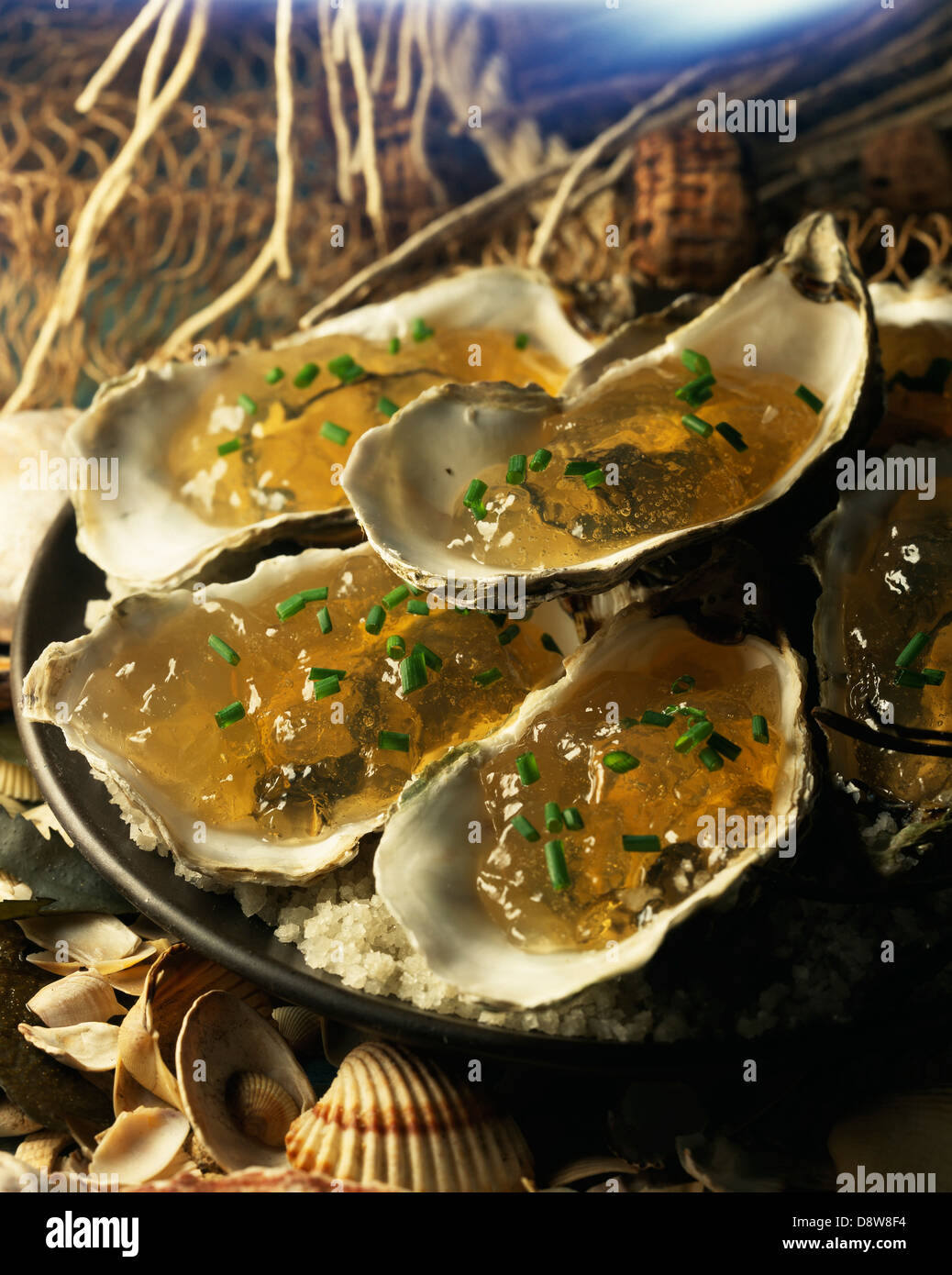 Oysters in acidulated jelly Stock Photo - Alamy