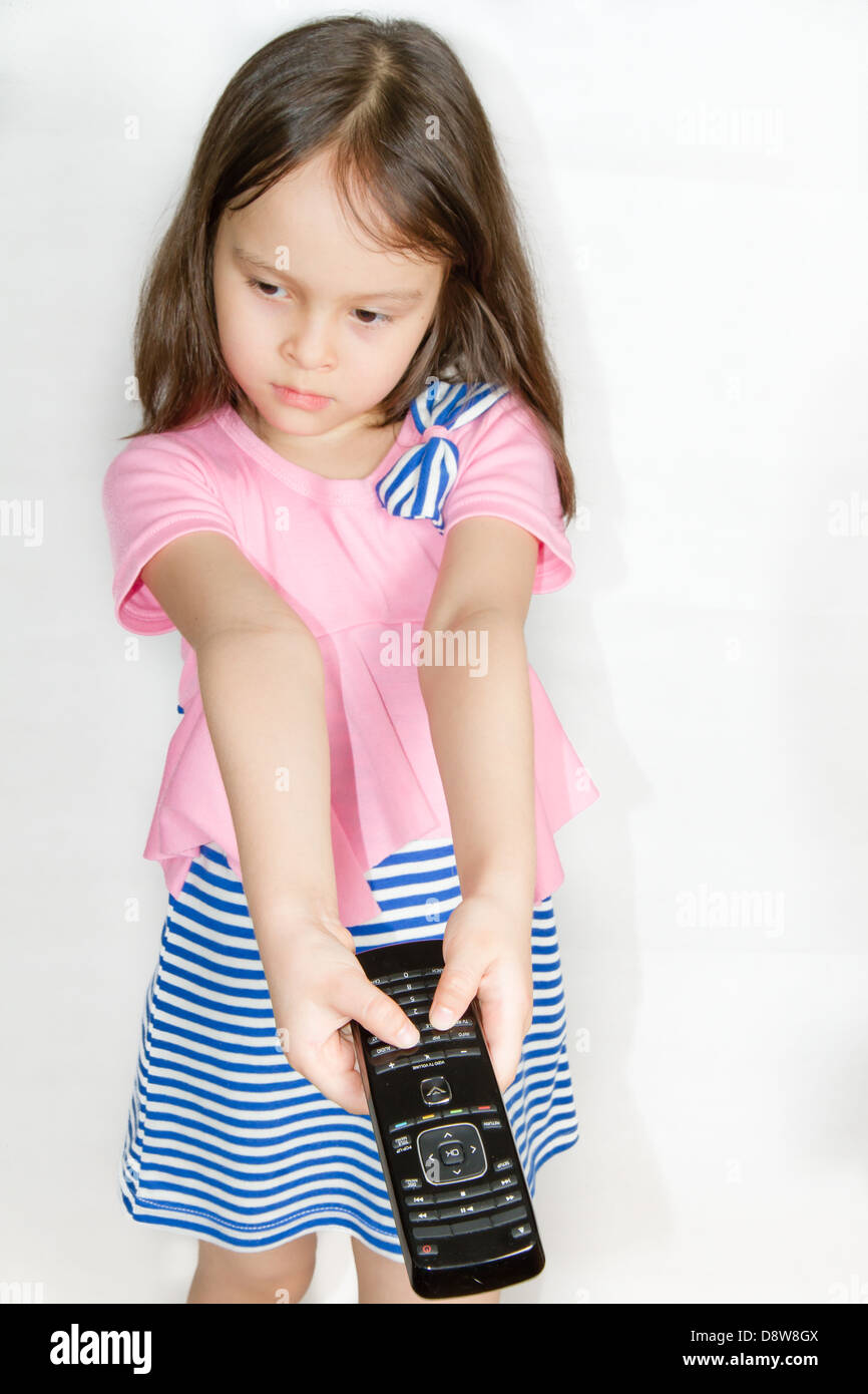 Asian child with remote control Stock Photo - Alamy
