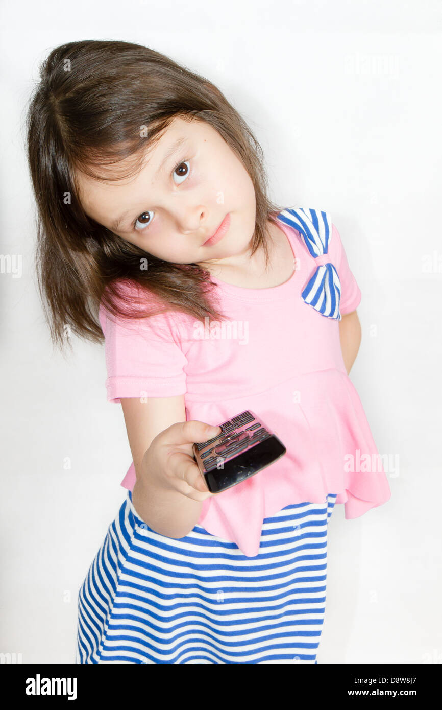 Asian child with remote control Stock Photo - Alamy
