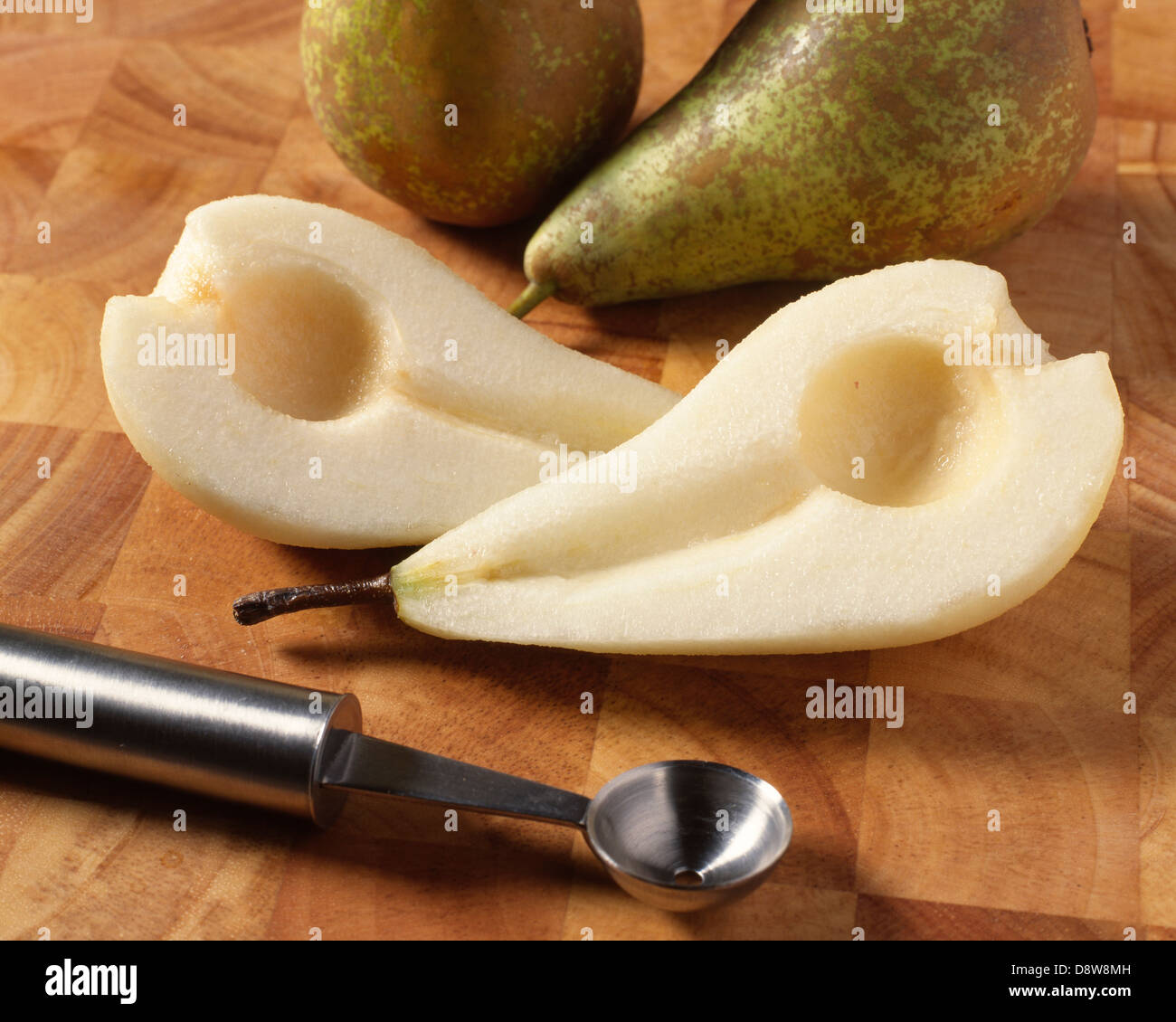 Peeling the pears,slice in two and take away the core with the pips ...